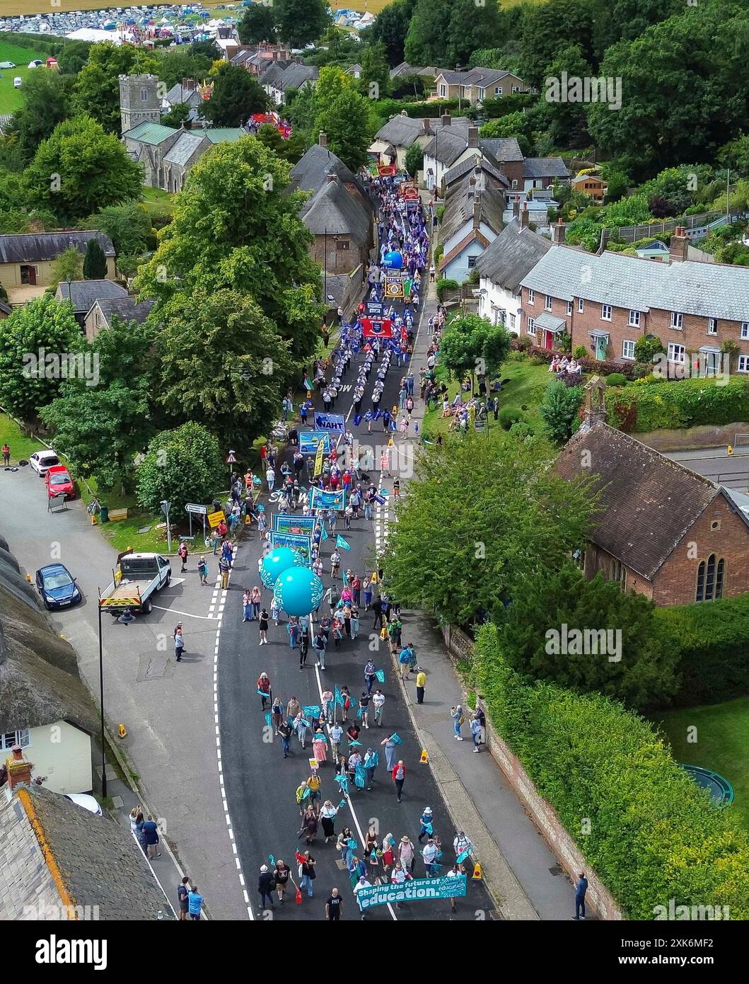 Tolpuddle, Dorset, UK. 21st July 2024. Aerial view of the parade at the ...