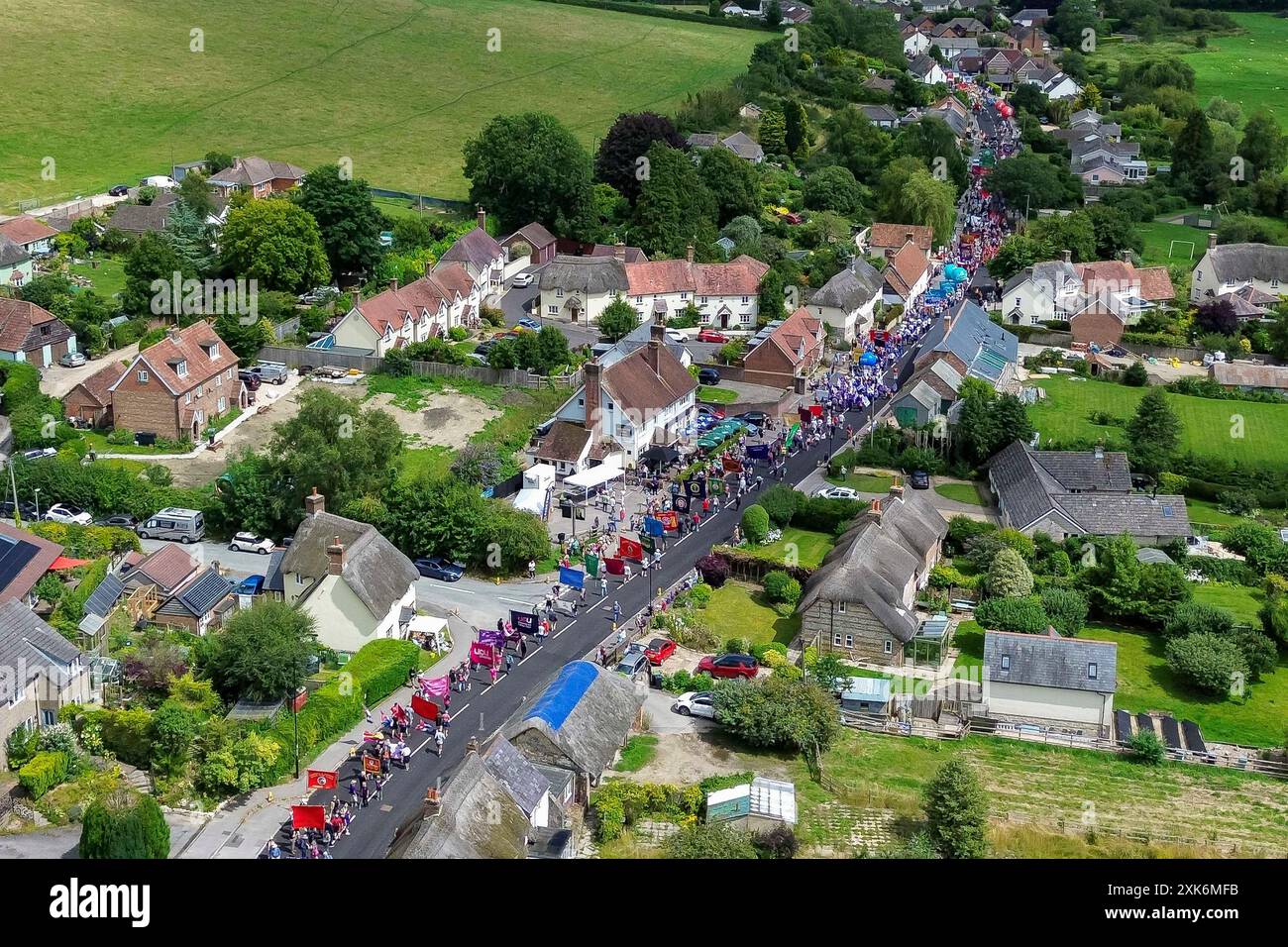 Tolpuddle, Dorset, UK. 21st July 2024. Aerial view of the parade at the ...