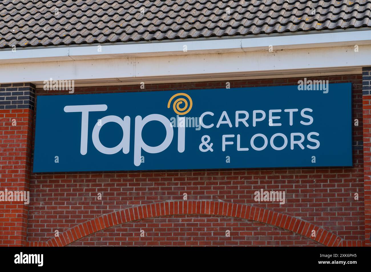 Cromer, Norfolk, UK - July 19 2024: External signage of UK based carpet ...