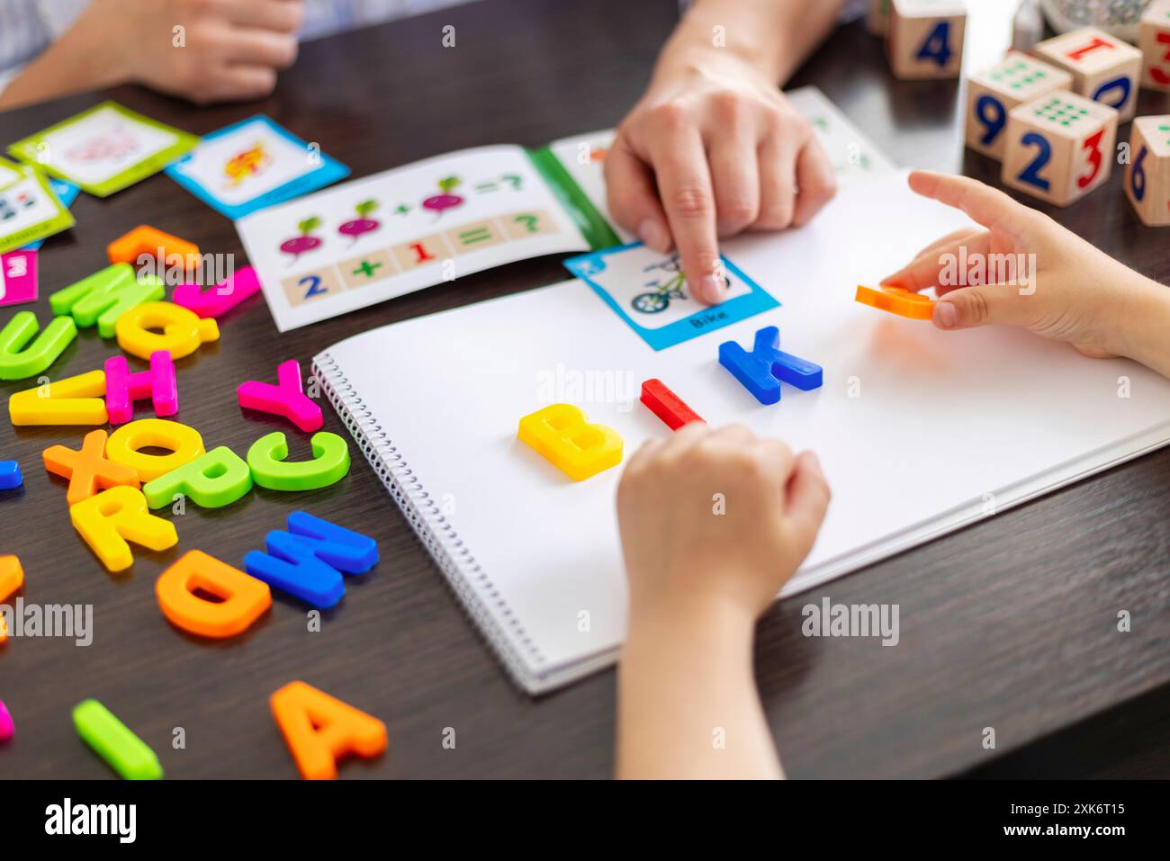 Children learning with colorful letters and cards Stock Photo - Alamy