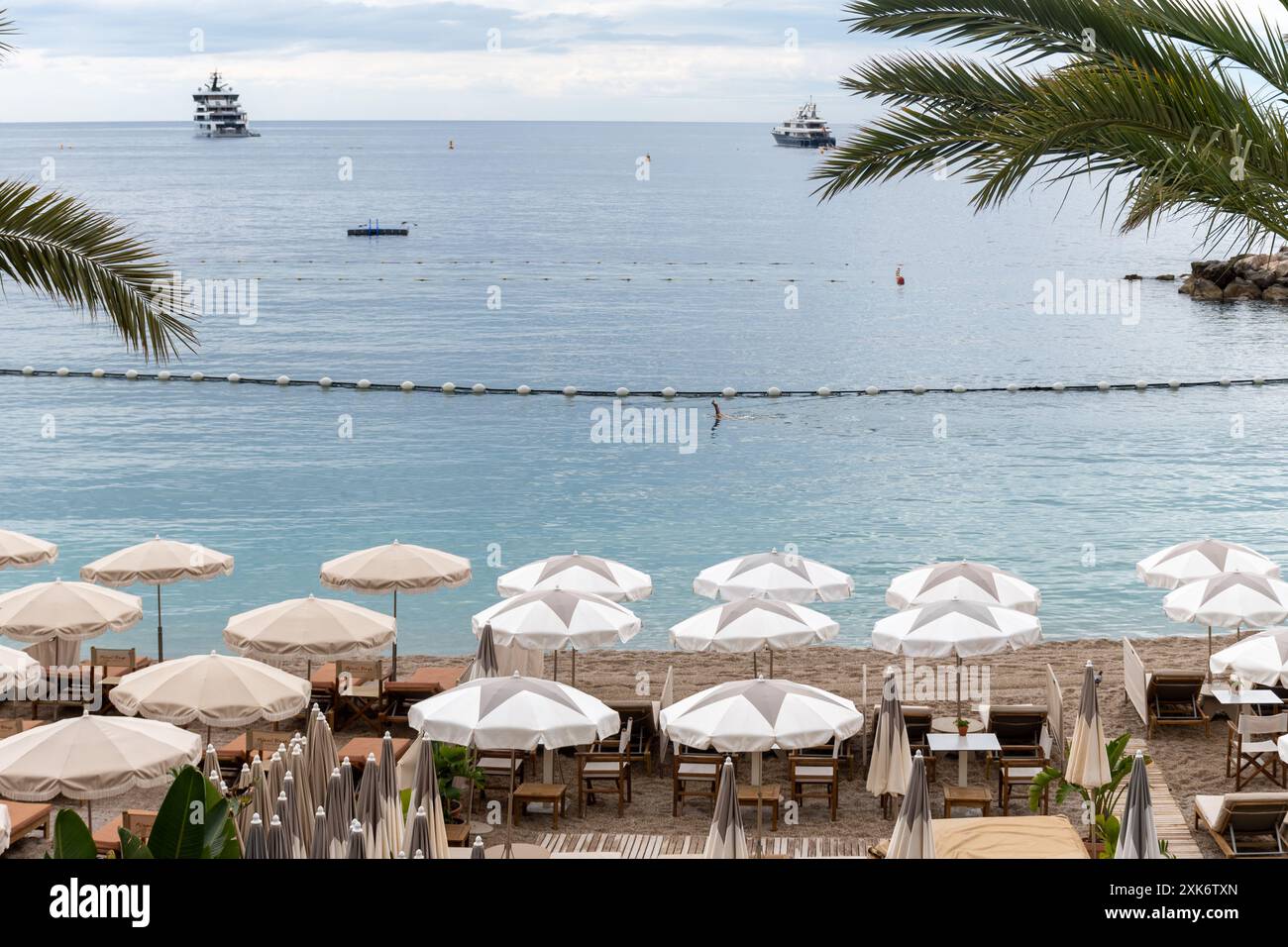 Sandy beach in Monaco, Monte-Carlo Lavrotto beach with clear sea water ...