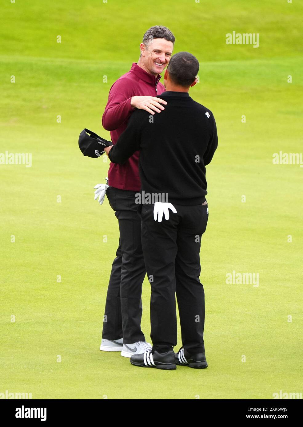 England's Justin Rose (left) and USA's Xander Schauffele after their rounds during day four of ...