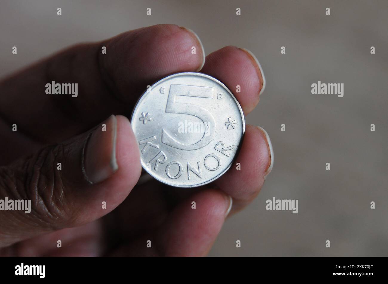 Copenhagen/ Denmark/21 July 2024/Swedish five kronor coin in danish ...