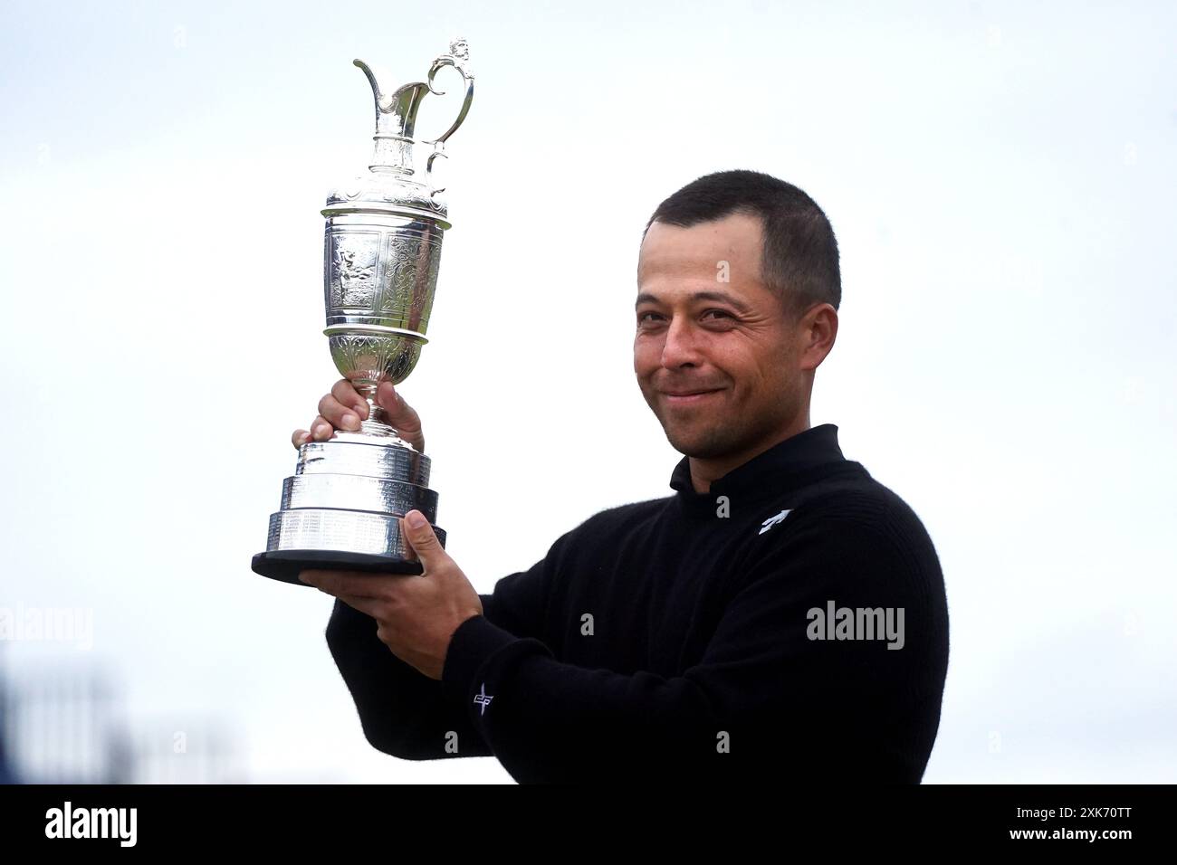 USA's Xander Schauffele celebrates with the Claret Jug after winning ...