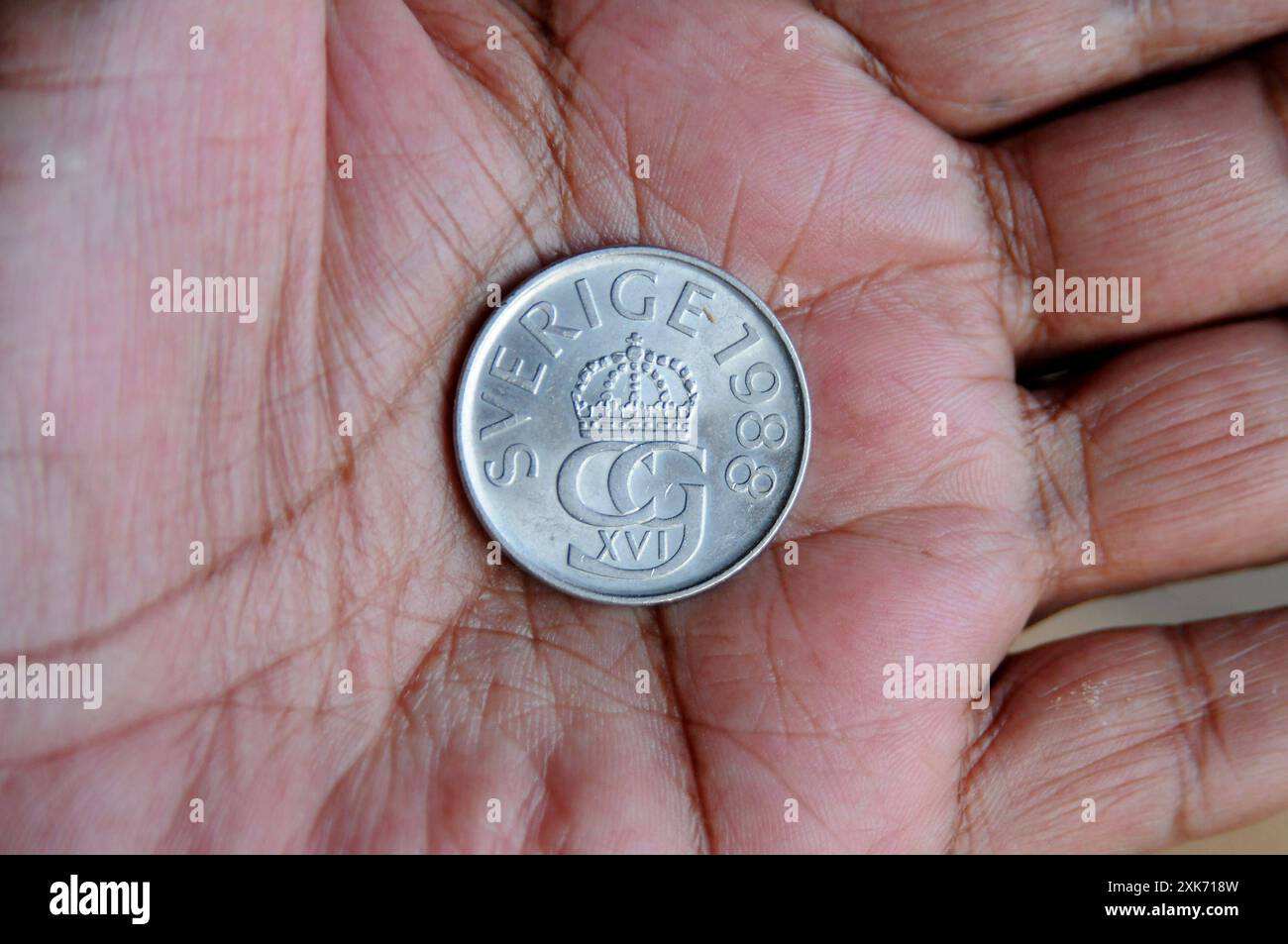 Copenhagen/ Denmark/21 July 2024/Swedish five kronor coin in danish ...