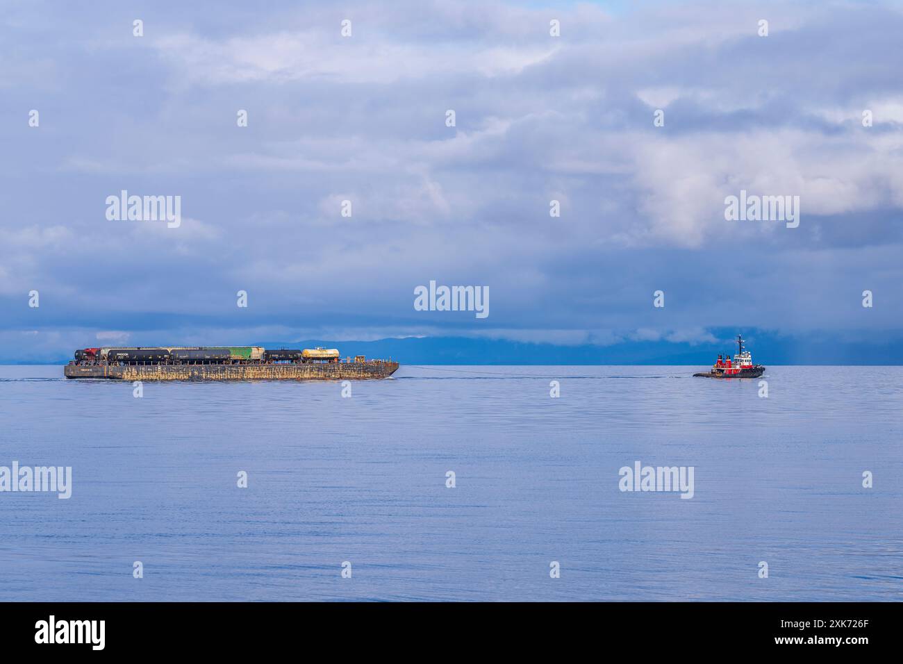 Gabriola, British Columbia, Canada - February 17, 2023: A tug boat tows ...