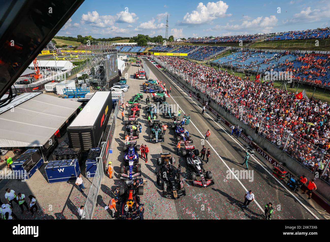 parc ferme with the F1 cars and the 09 APX GP Modified F2 car prepared ...