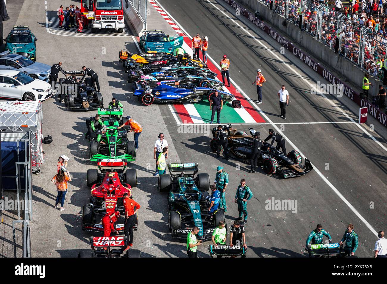 parc ferme with the F1 cars and the 07 and 09 APX GP Modified F2 car ...