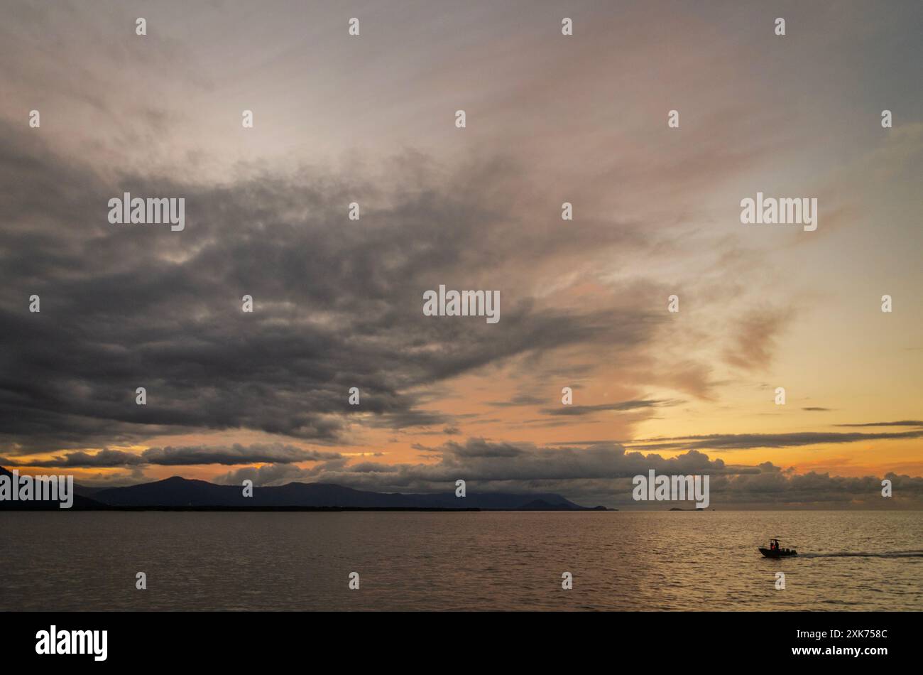 Dramatic clouds during sunset over Cairns. Cairns is major tourist ...