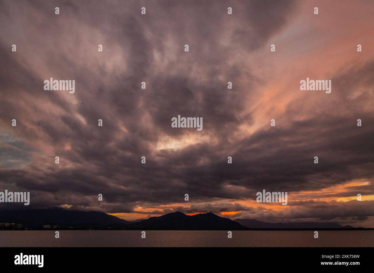 Dramatic clouds during sunset over Cairns. Cairns is major tourist ...