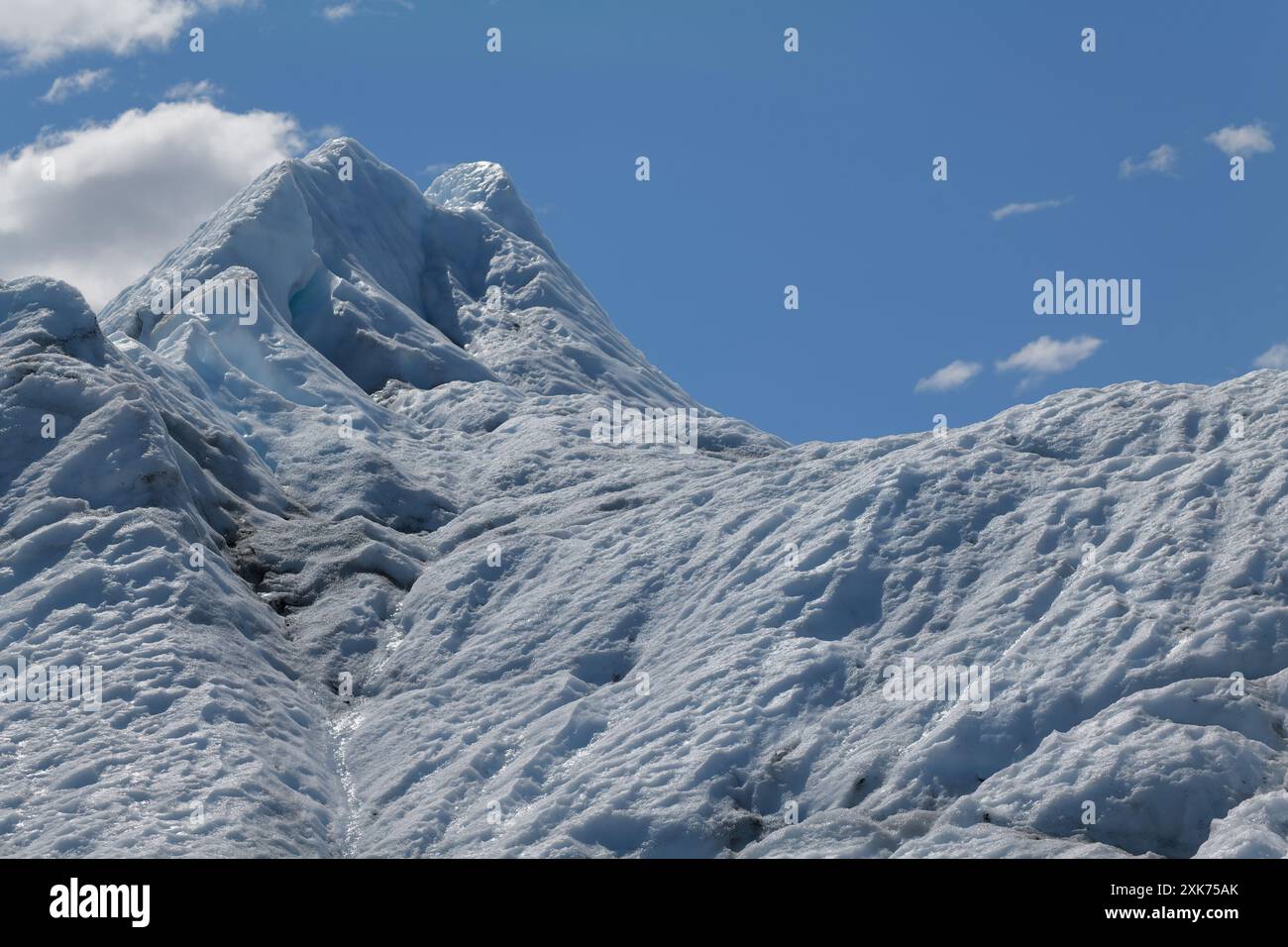 Hiking Alaska’s Matanuska Glacier fed by Mount Marcus Baker in the ...