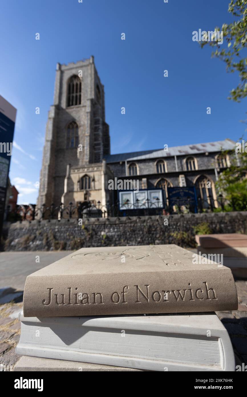 A stonework book bench display of books with the top book labelling ...