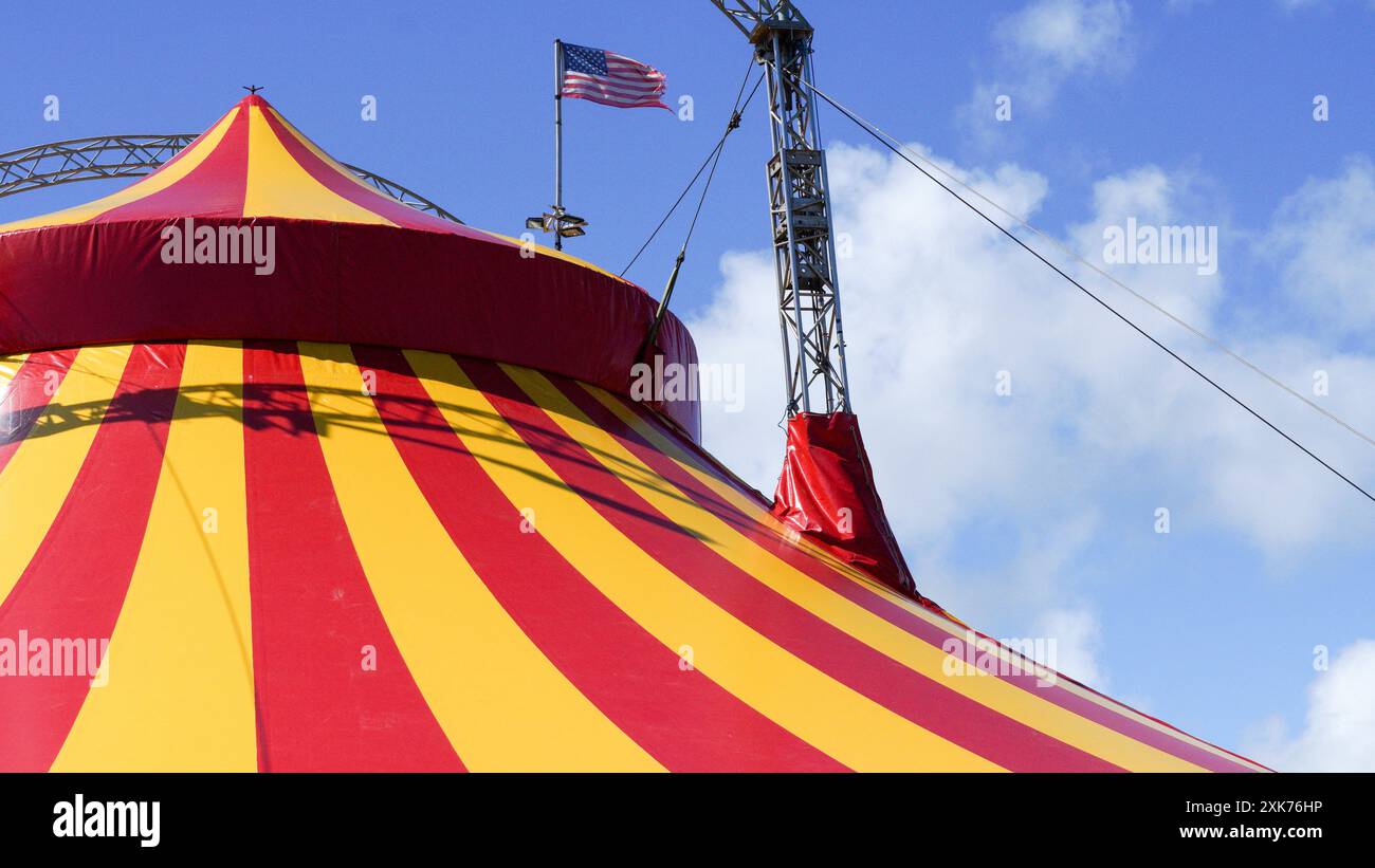 Bridgend, Wales - July 7 2024: A large, brightly coloured circus big ...
