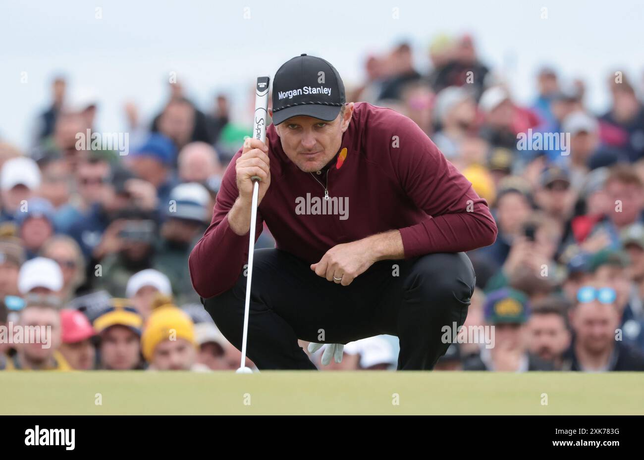 Troon, UK. 21st July, 2024. Justin Rose lines up a putt at the 152nd Open Championship at Royal ...