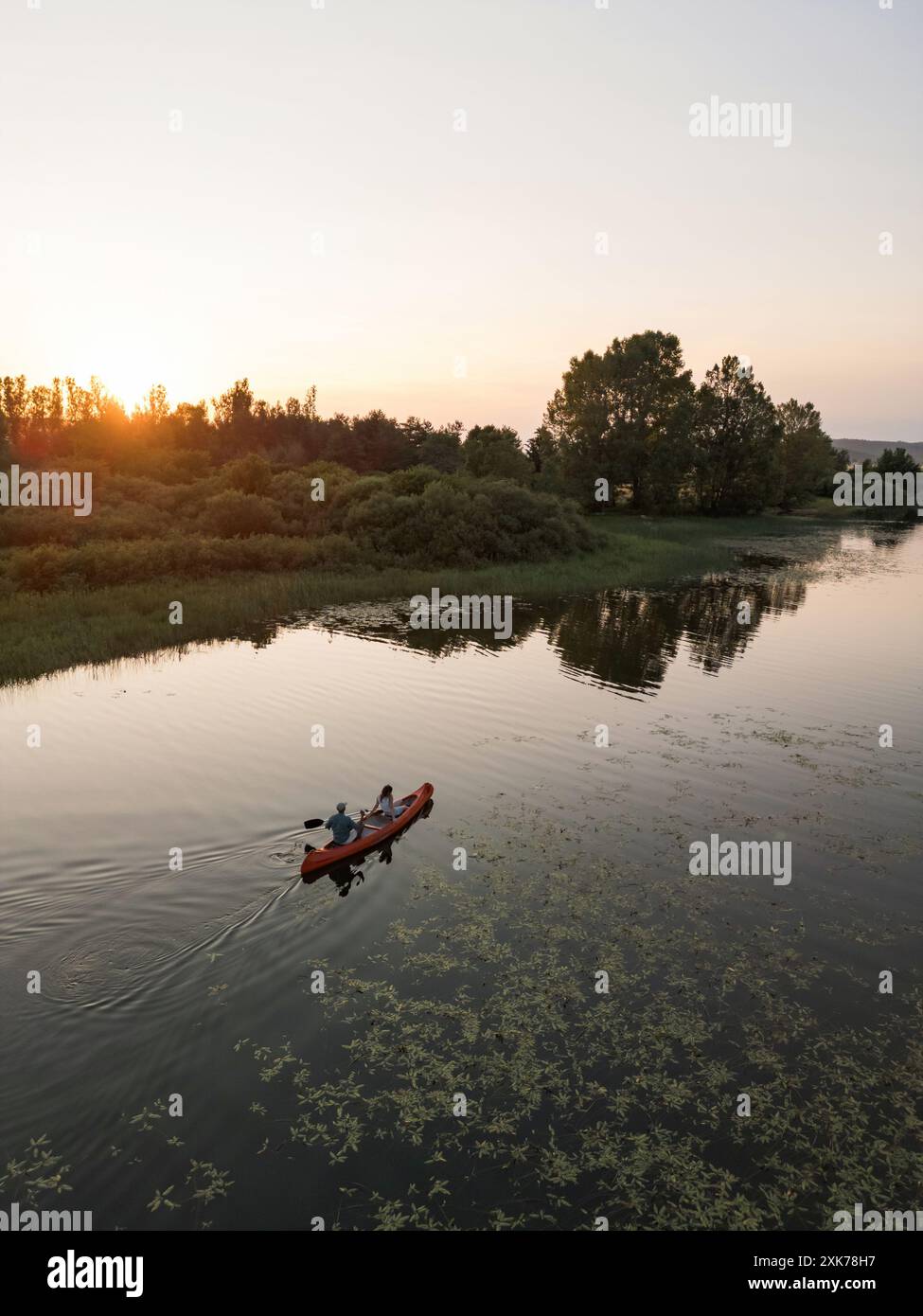 Aerial drone shot couple paddling hi-res stock photography and images ...