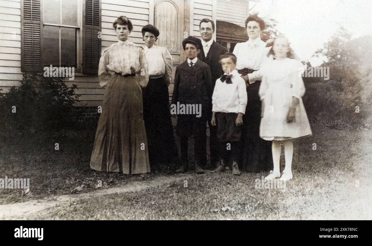 Vintage photograph of 3 generations standing outside of their home, USA ...