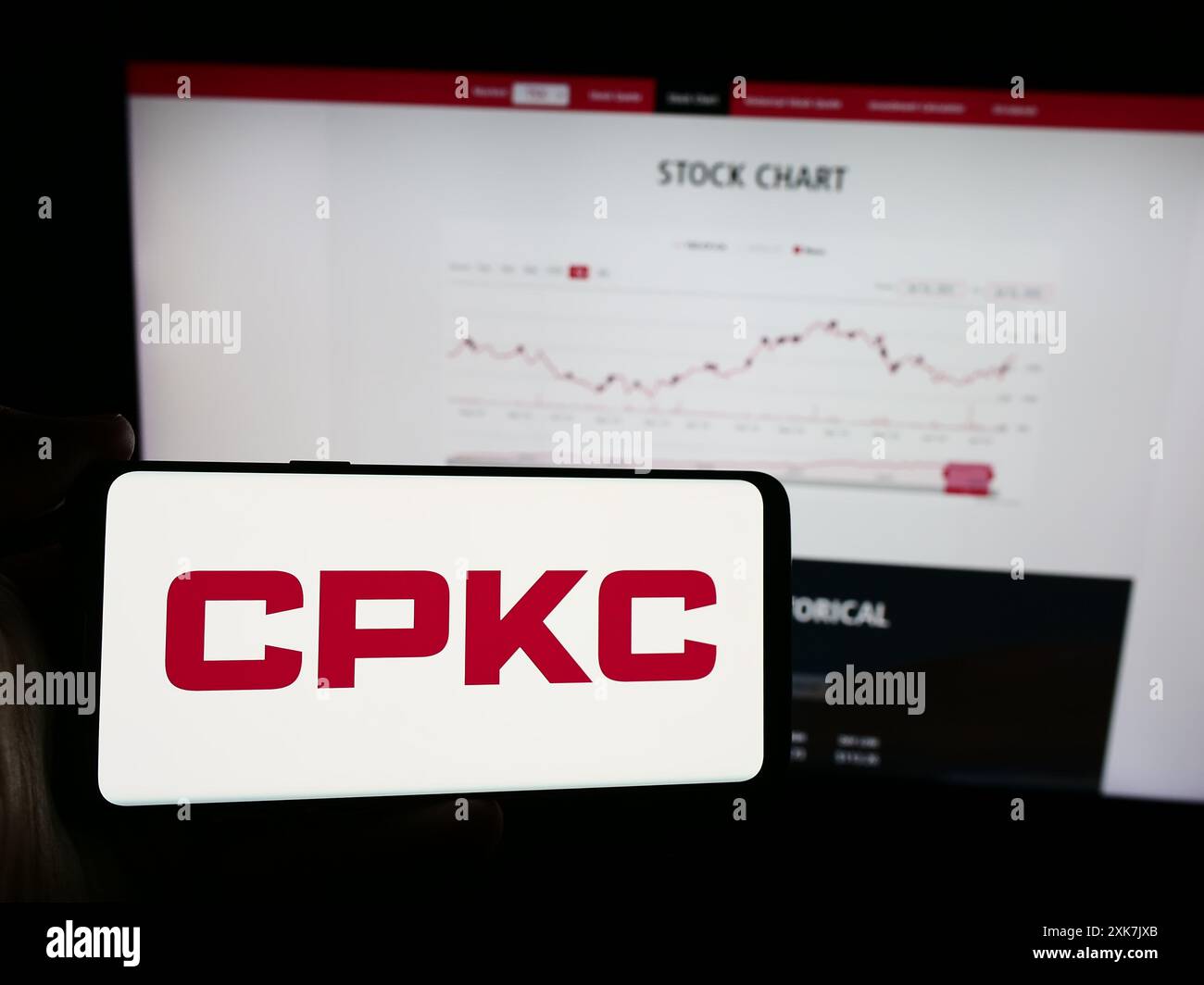 Person holding mobile phone with logo of railway company Canadian ...