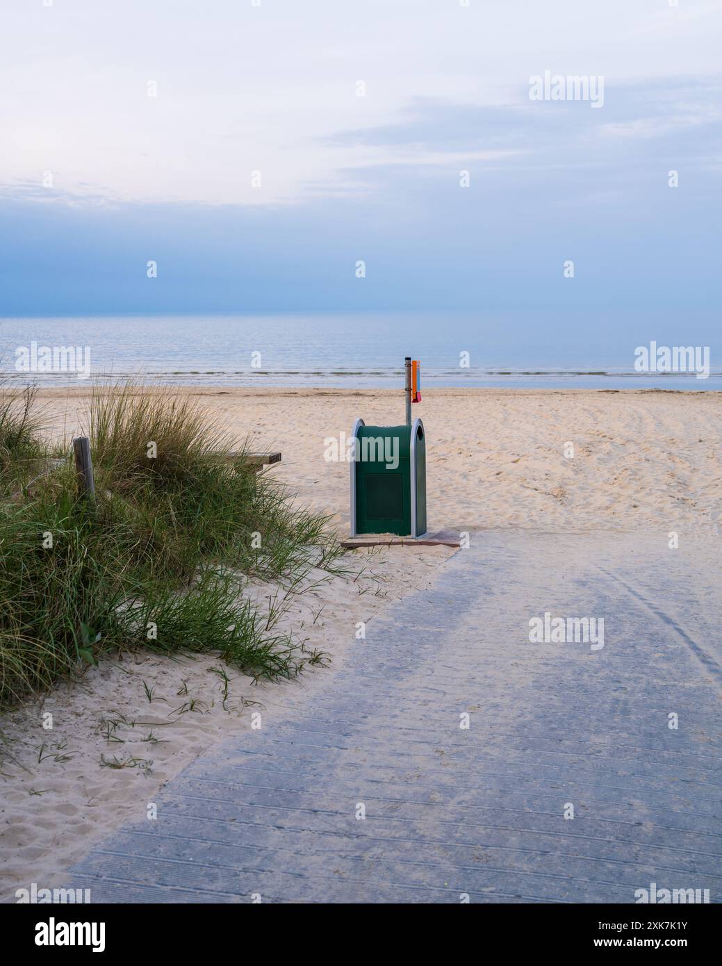 A trash can stands on the beach, Baltic Sea. Germany, Usedom. Caring ...