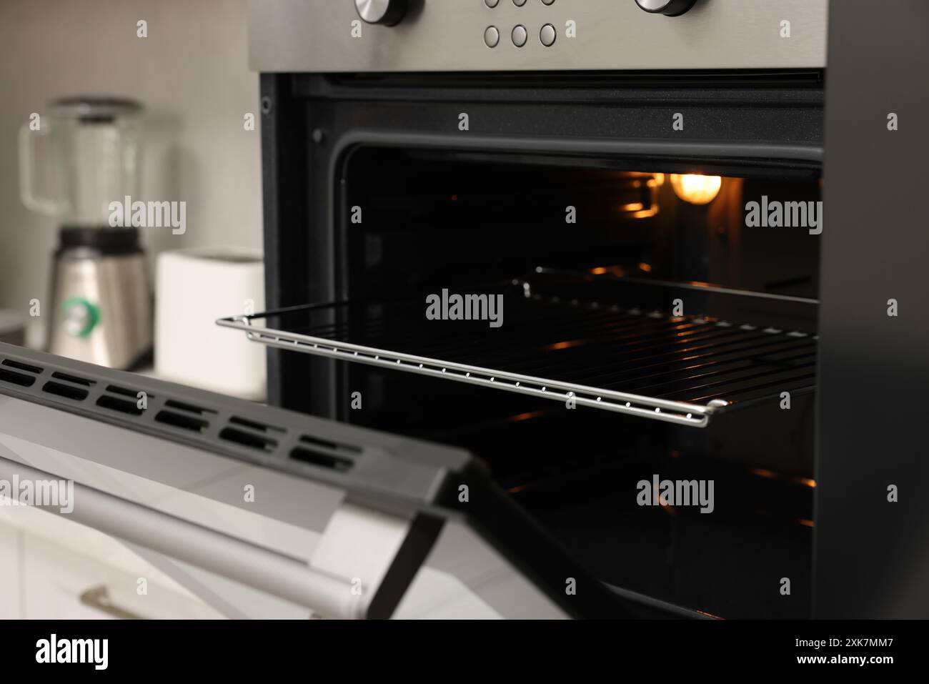 Open electric oven in kitchen. Cooking appliance Stock Photo - Alamy
