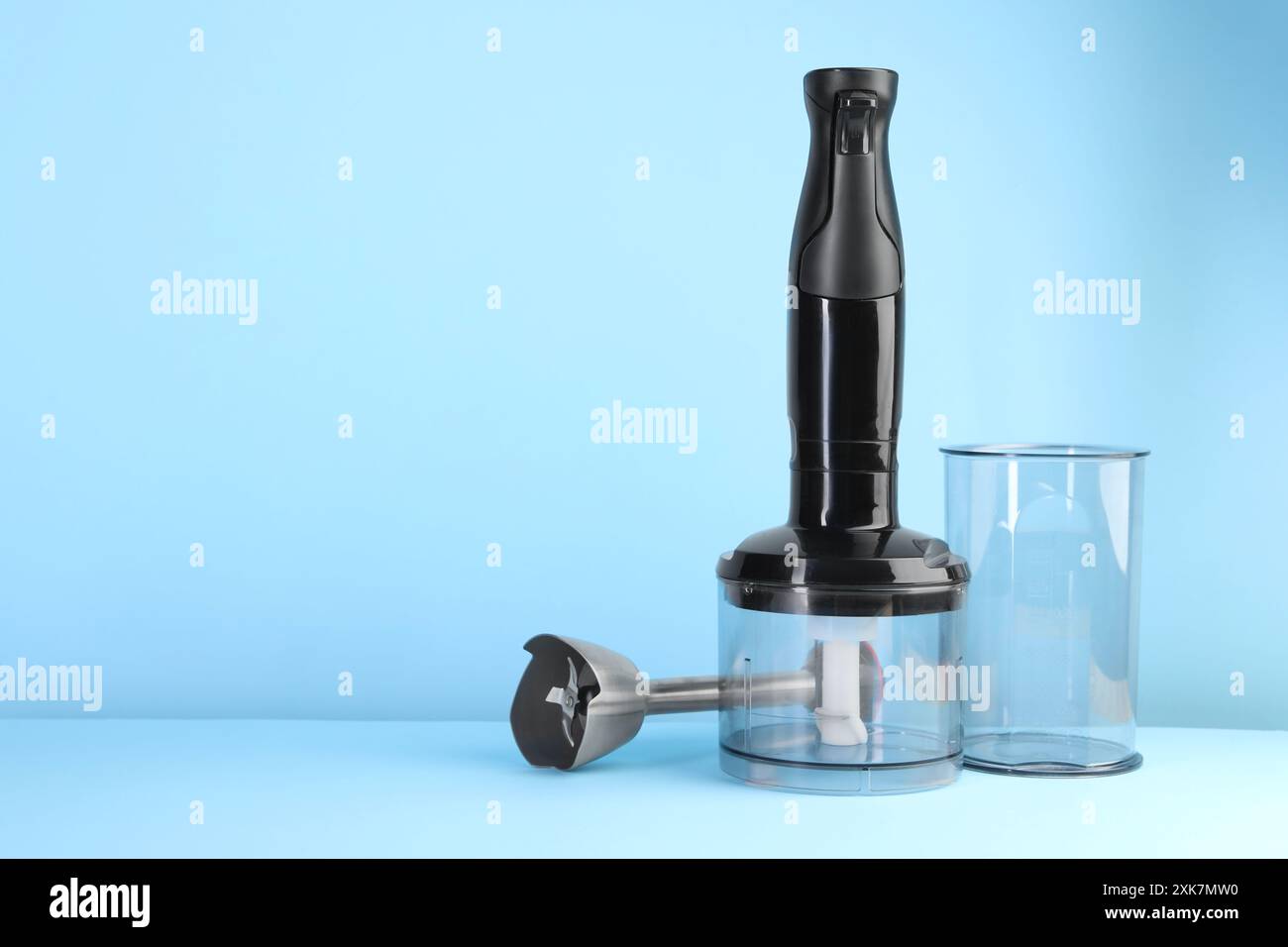 Hand blender kit on light blue background, space for text Stock Photo ...