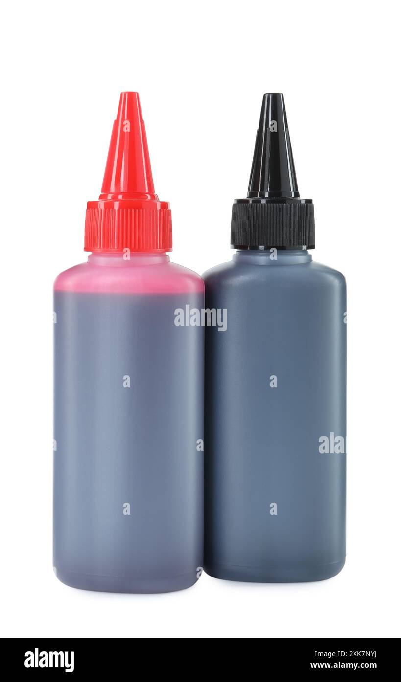 Bottles of different printer ink isolated on white Stock Photo - Alamy