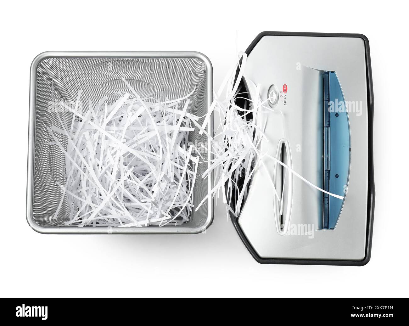 Shredder, metal basket and paper strips isolated on white, top view ...