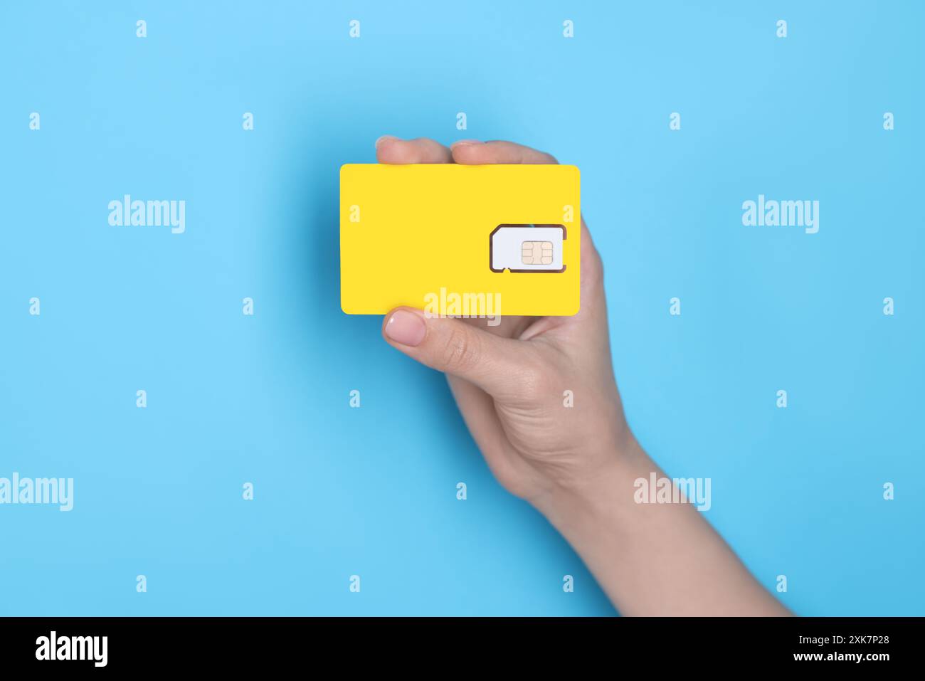 Hand holding sim card hi-res stock photography and images - Alamy