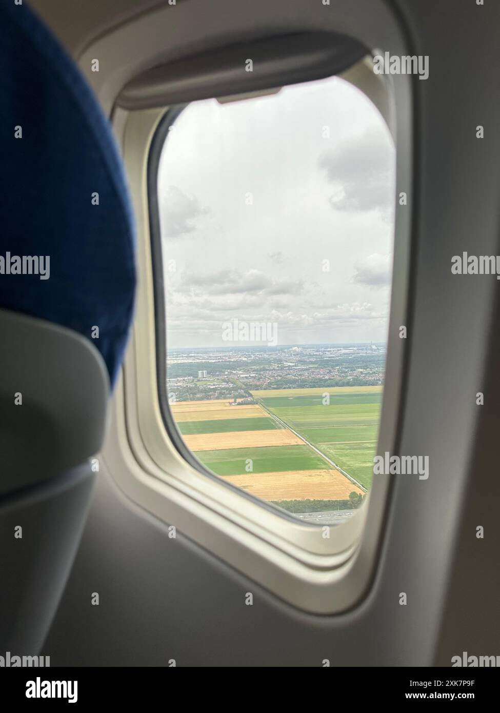 Picturesque view through plane window during flight Stock Photo - Alamy