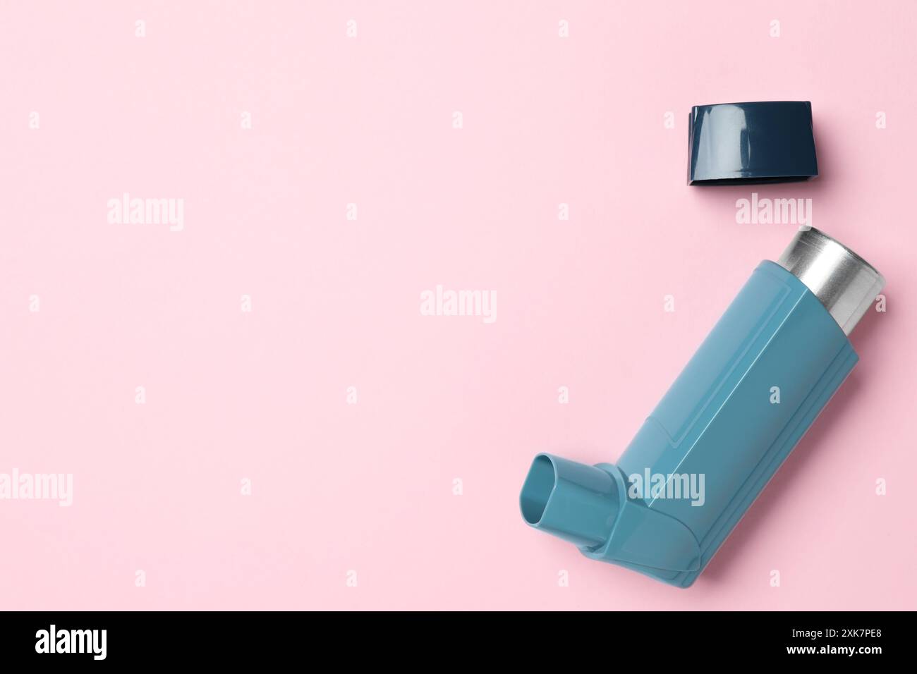 Asthma inhaler on pink background, top view. Space for text Stock Photo ...