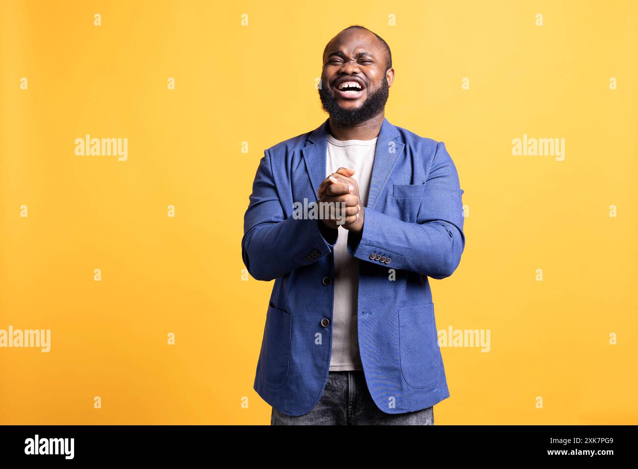 Portrait of happy african american man laughing hard, amused by joke ...