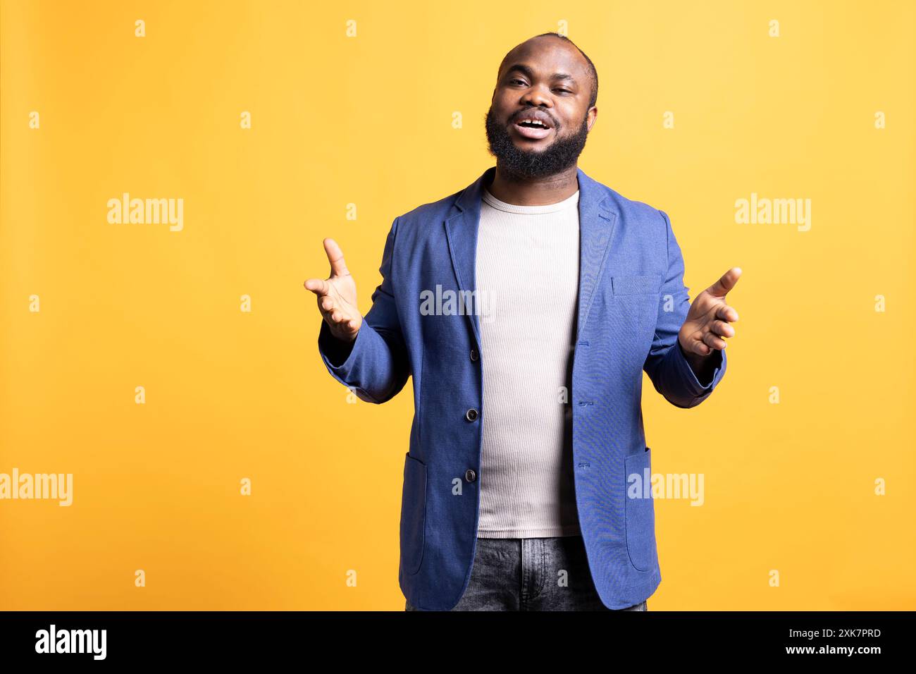 Portrait of african american lecturer holding monologue and gesturing ...