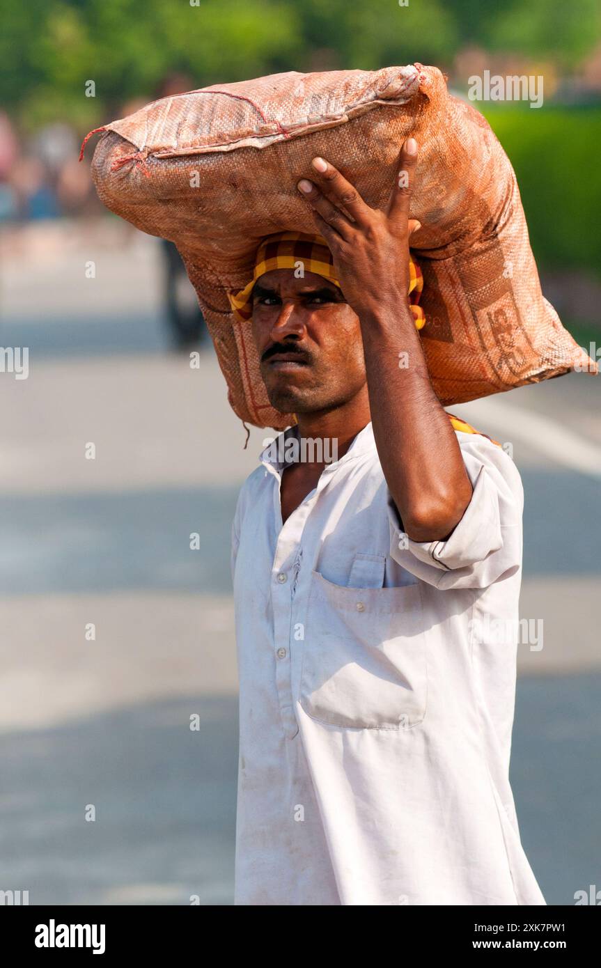 Man carrying full sack on hi-res stock photography and images - Alamy