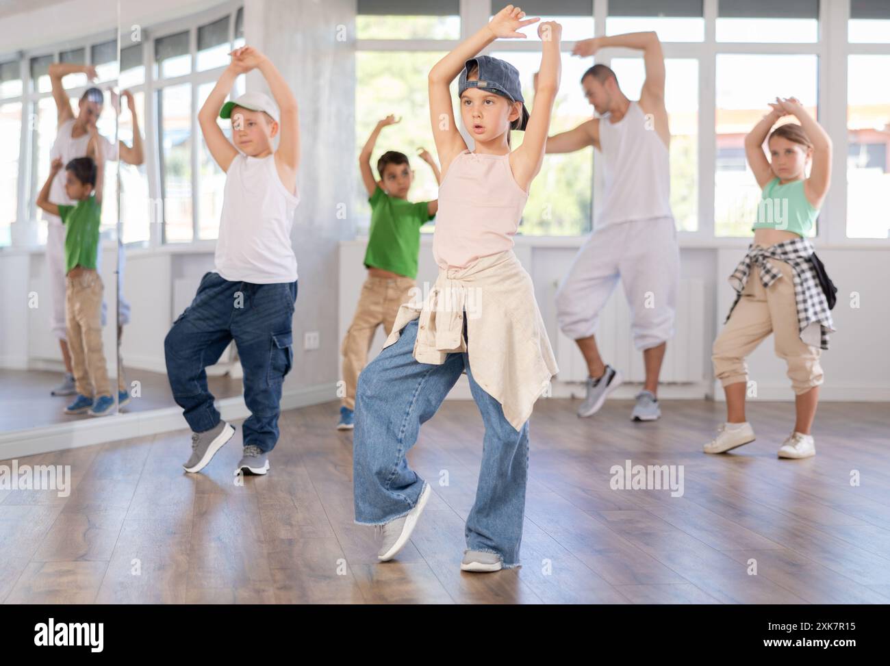 Tween girl mastering krump dance in children dance studio Stock Photo ...