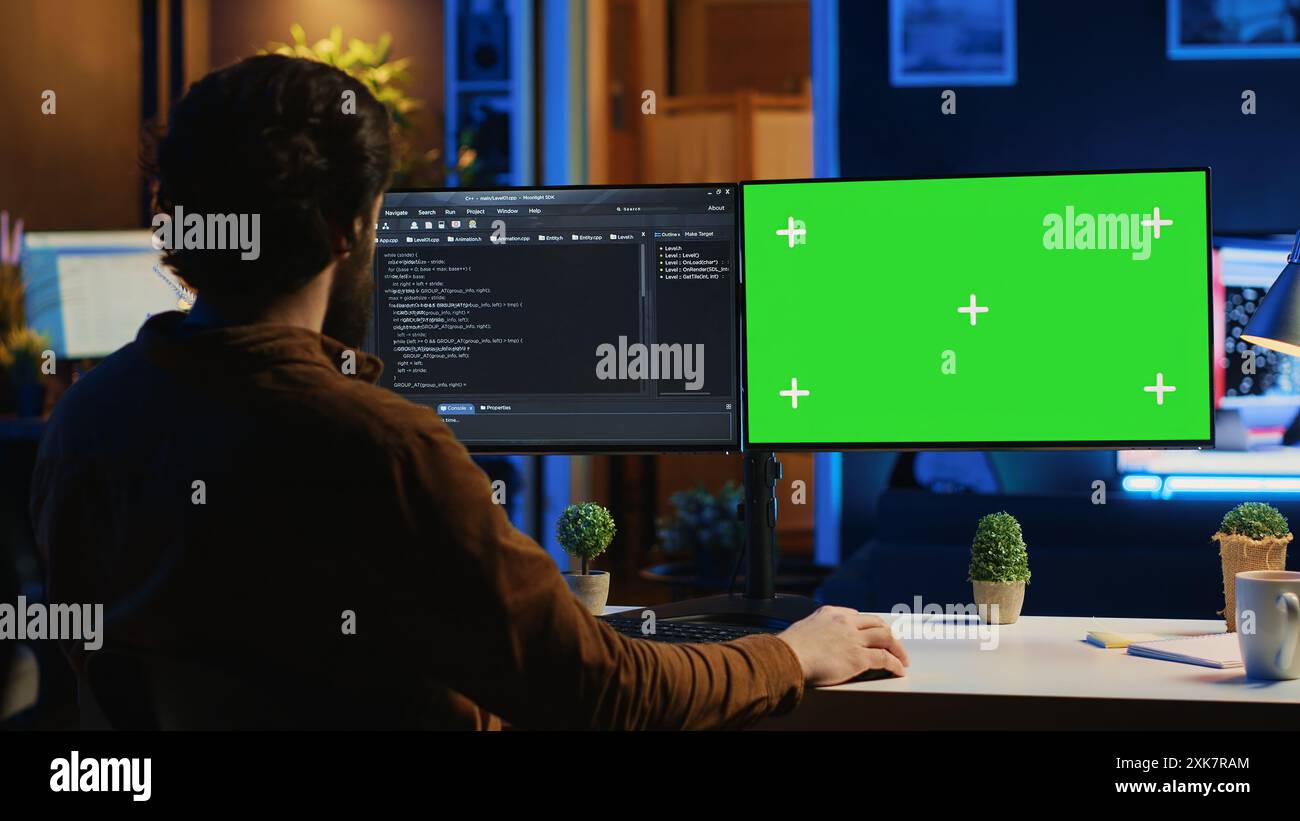 Freelancing computer scientist typing hi-res stock photography and ...