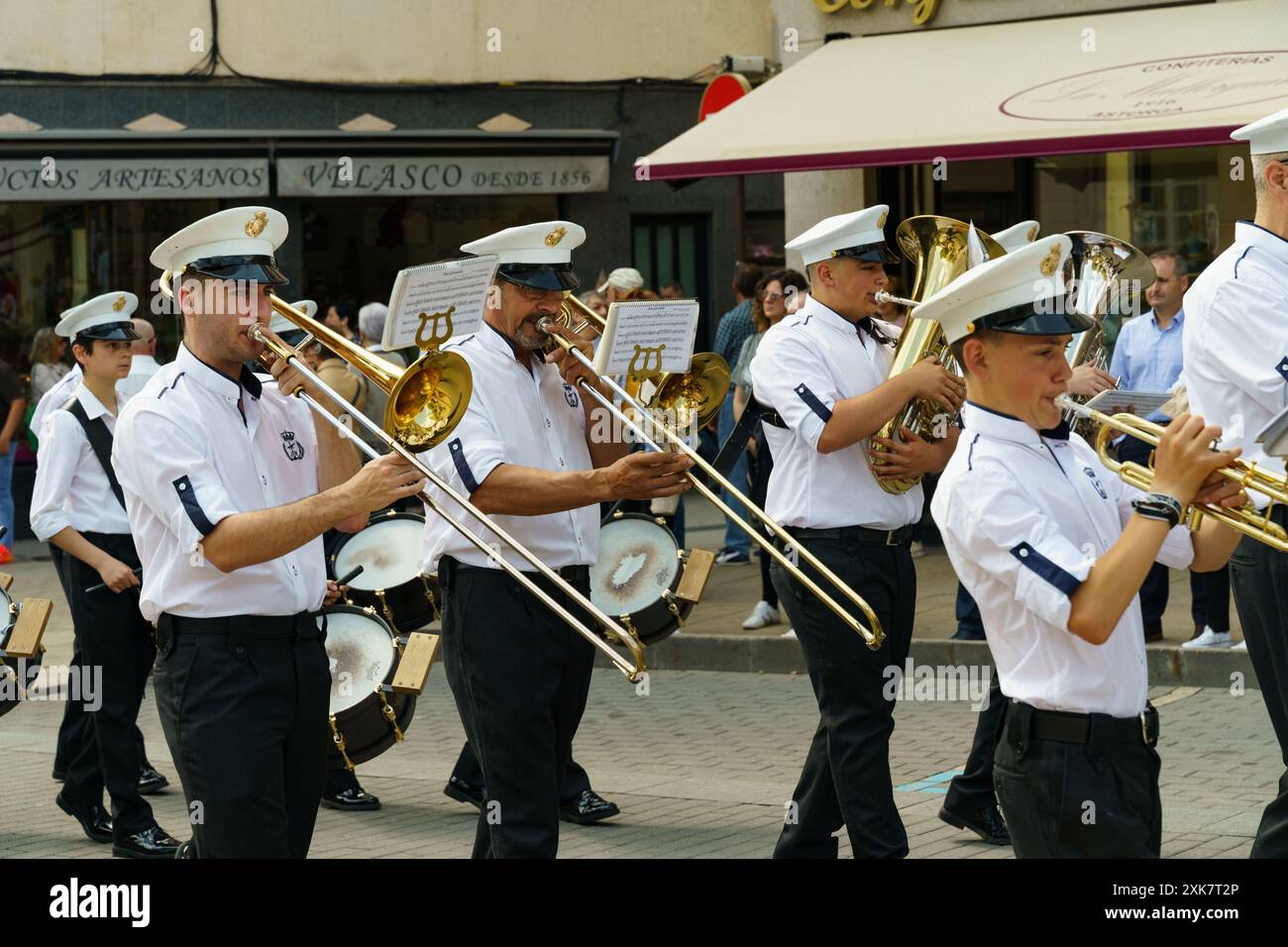 Astorga, Spain - June 4, 2023: A group of men in uniform marching down ...