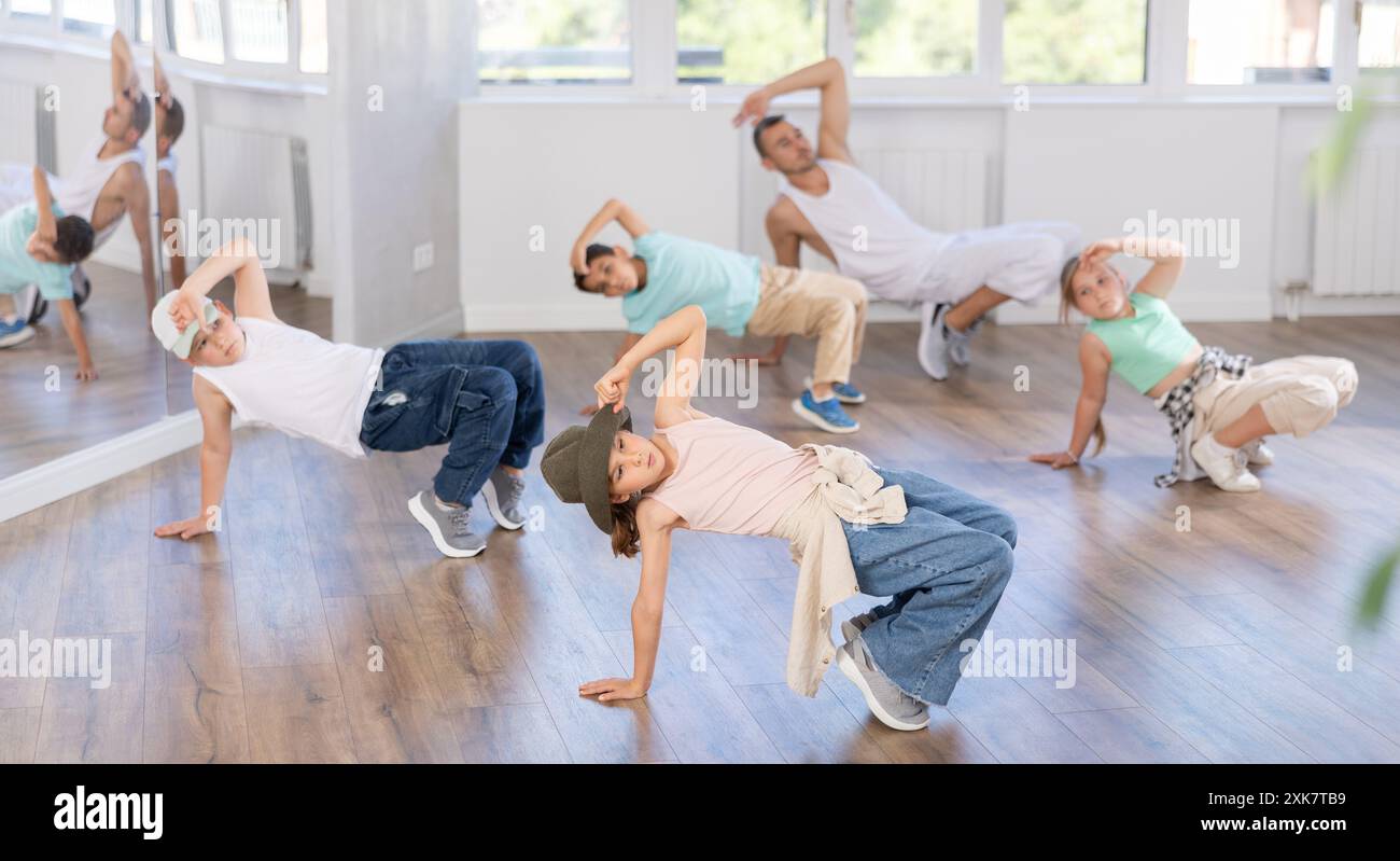 Tween girl mastering krump dance in children dance studio Stock Photo ...