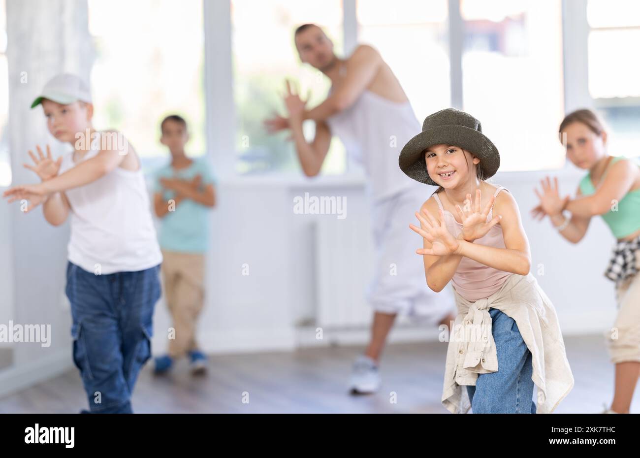Tween girl mastering krump dance in children dance studio Stock Photo ...