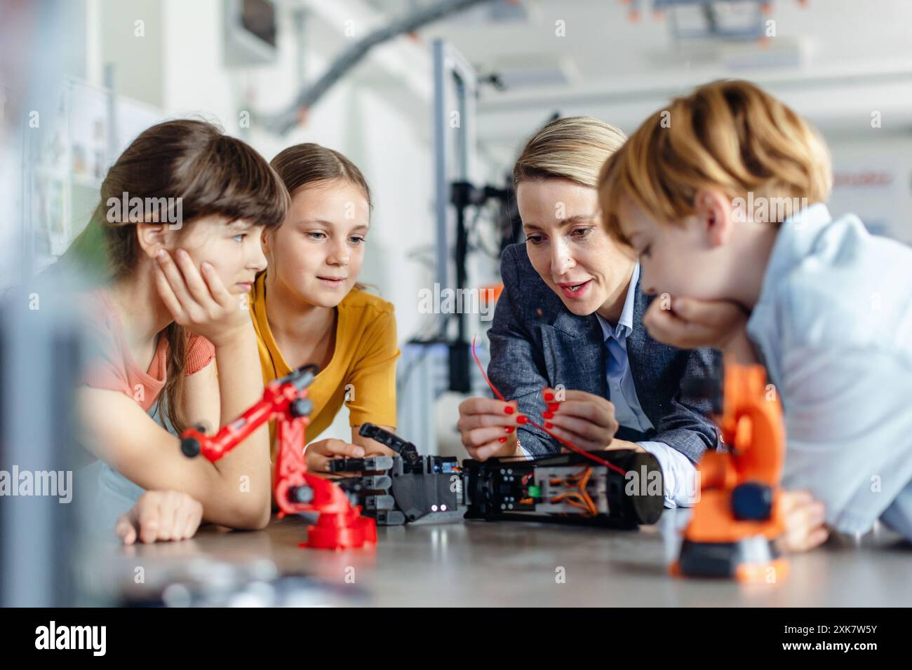 Children learning robotics in Elementary school. Young students ...