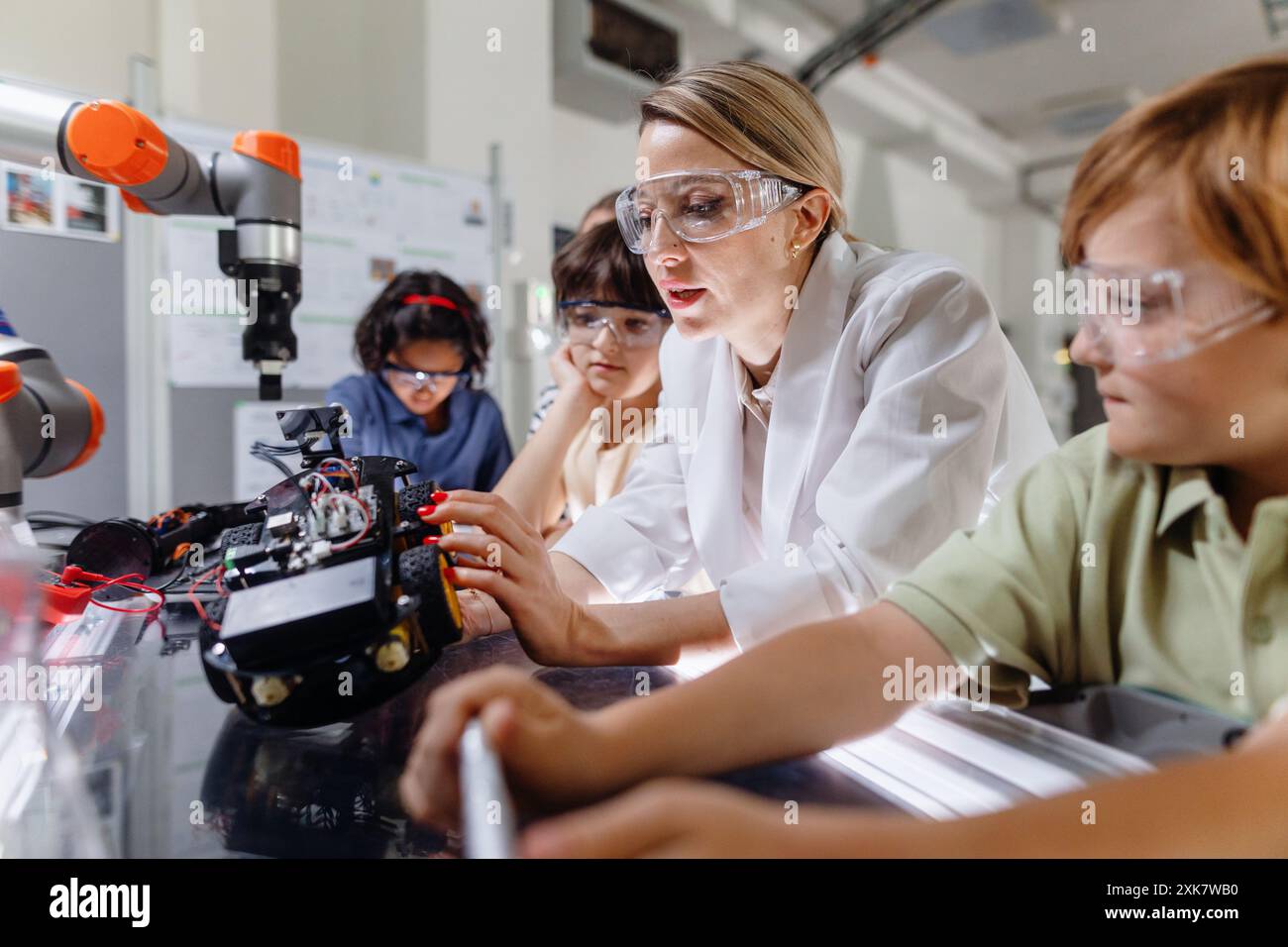 Children learning robotics in Elementary school. Young students ...
