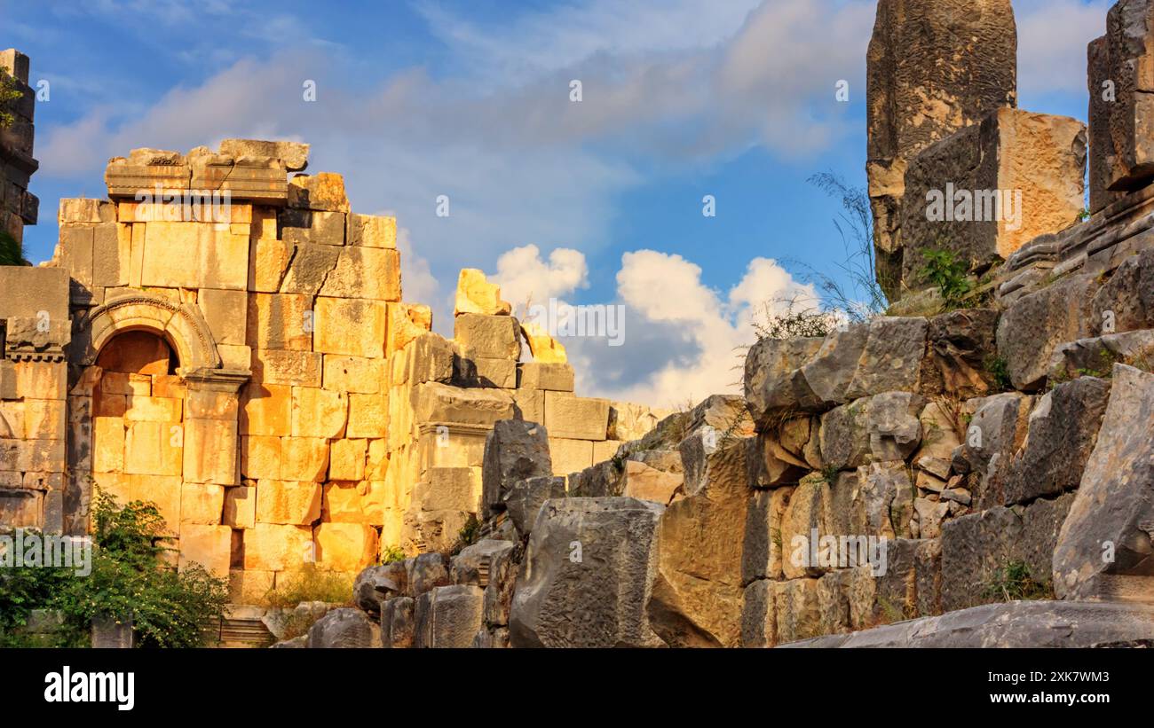 Summer mediterranean cityscape - view of the ruins of the theater in the ancient city of Myra ...