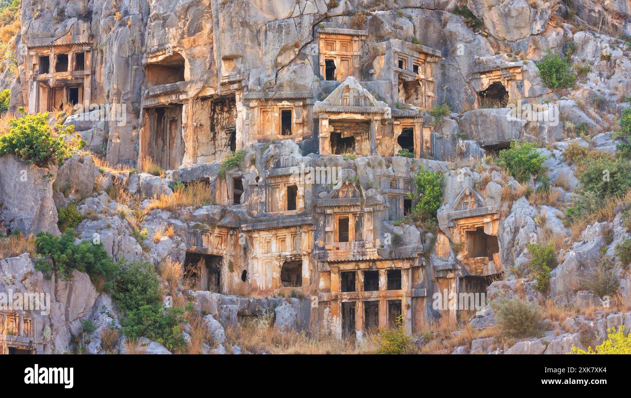 Summer mediterranean cityscape - view of the ruins of ancient Greek tombs in the ancient city of ...