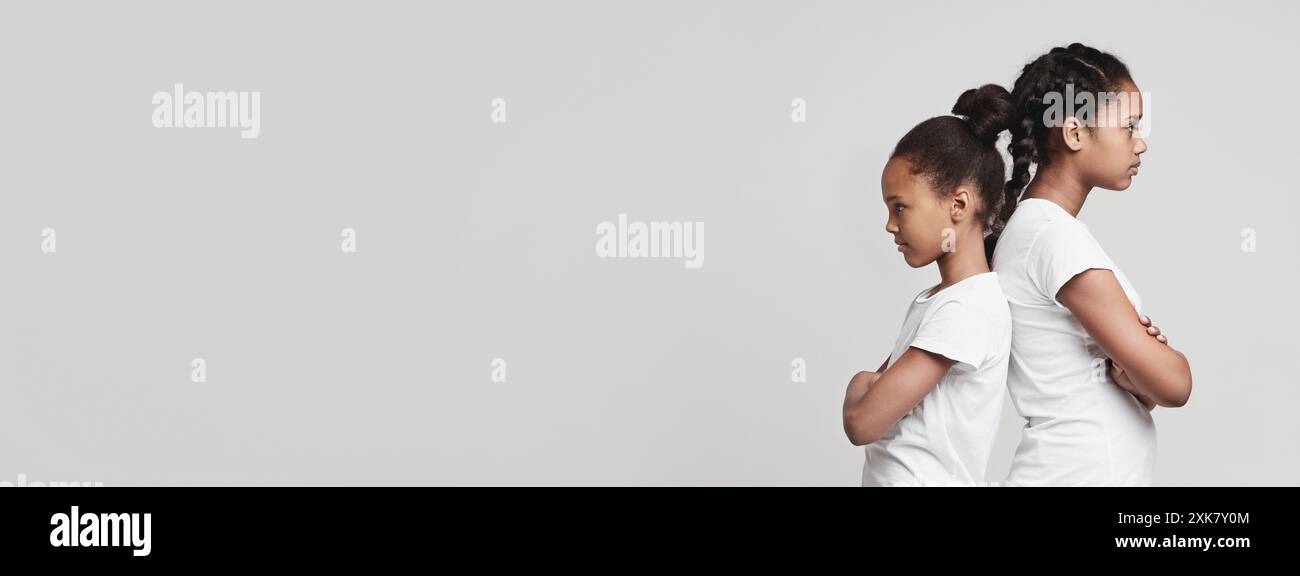 Sisters back back arms crossed hi-res stock photography and images - Alamy