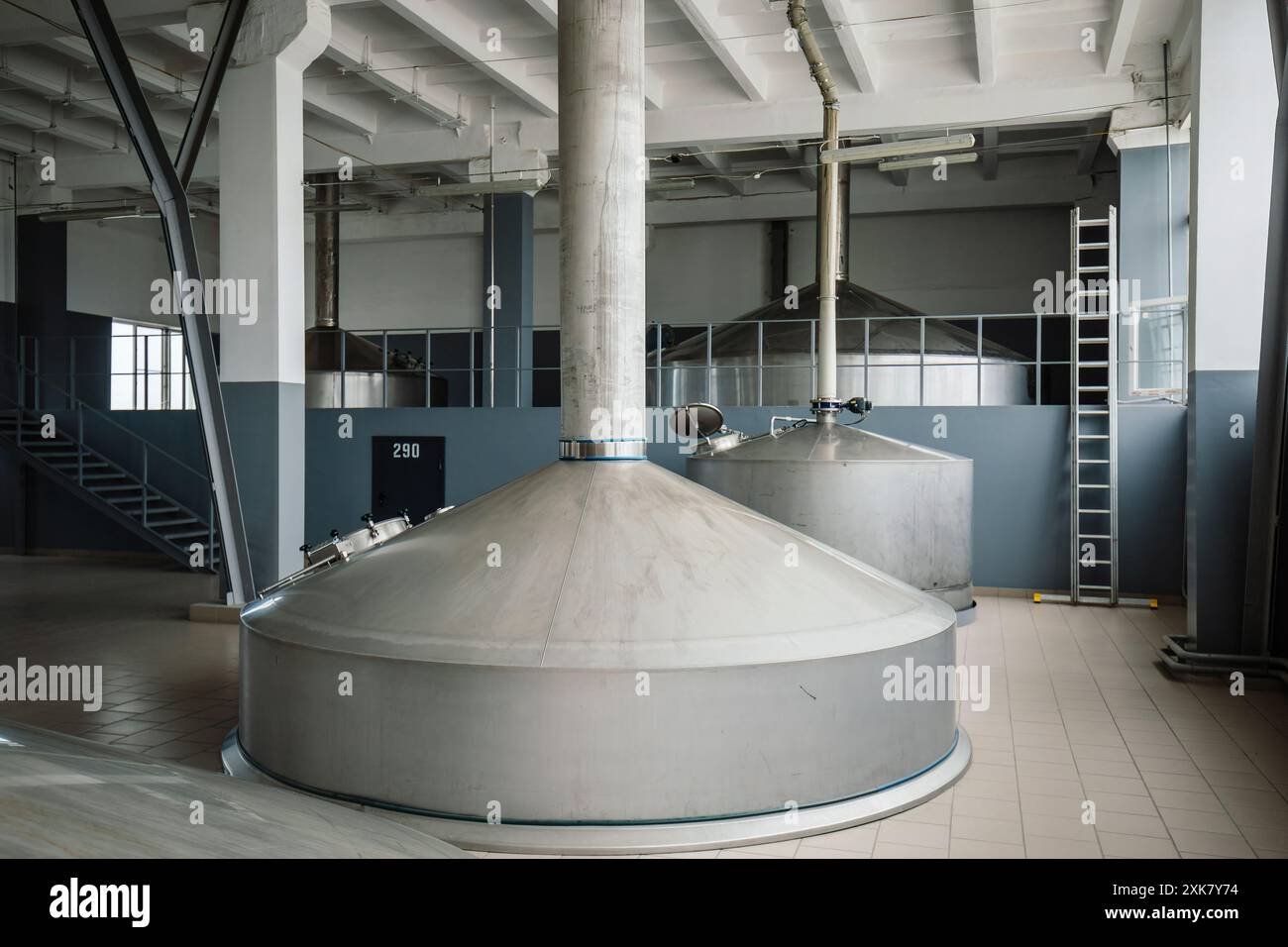 Steel vats for mash fermentation in modern brewery Stock Photo - Alamy