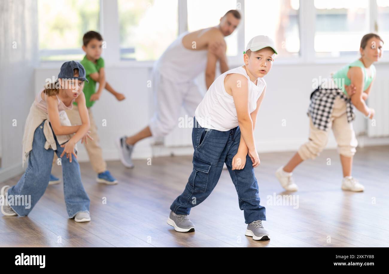 Tween boy dancer rehearsing krump dance in kids studio Stock Photo - Alamy