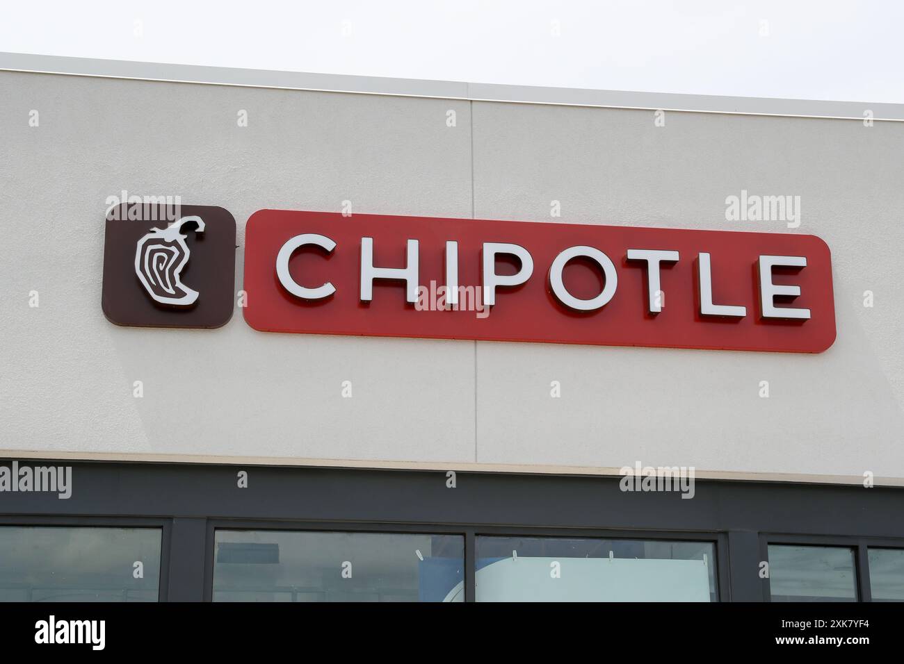 The logo of Chipotle is seen on the outside of one of the chain's ...