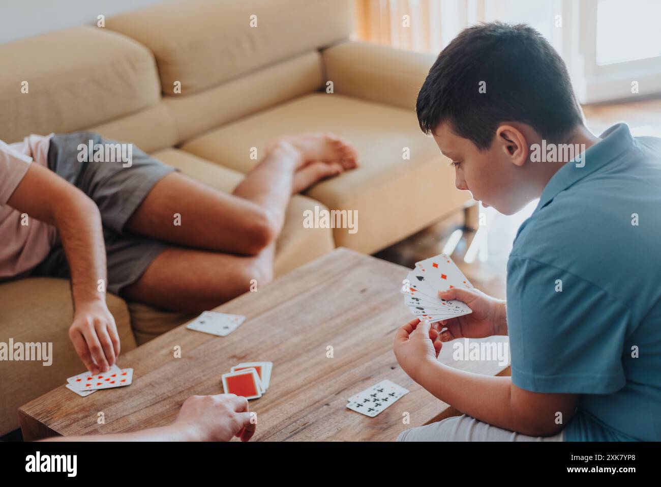 Family teenagers playing table hi-res stock photography and images - Alamy