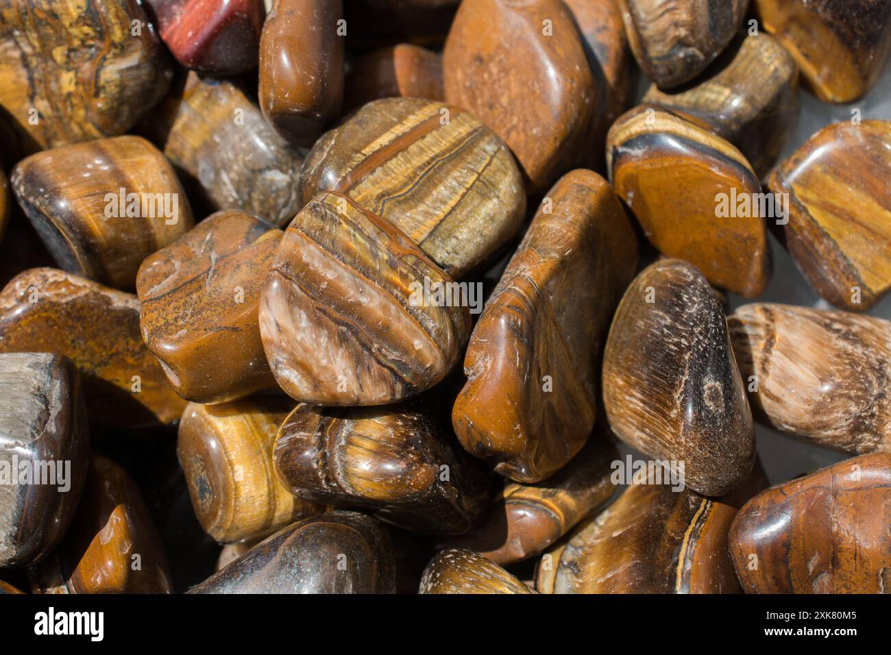 tiger's eye and hawk's eye gemstone as natural mineral rock specimen ...