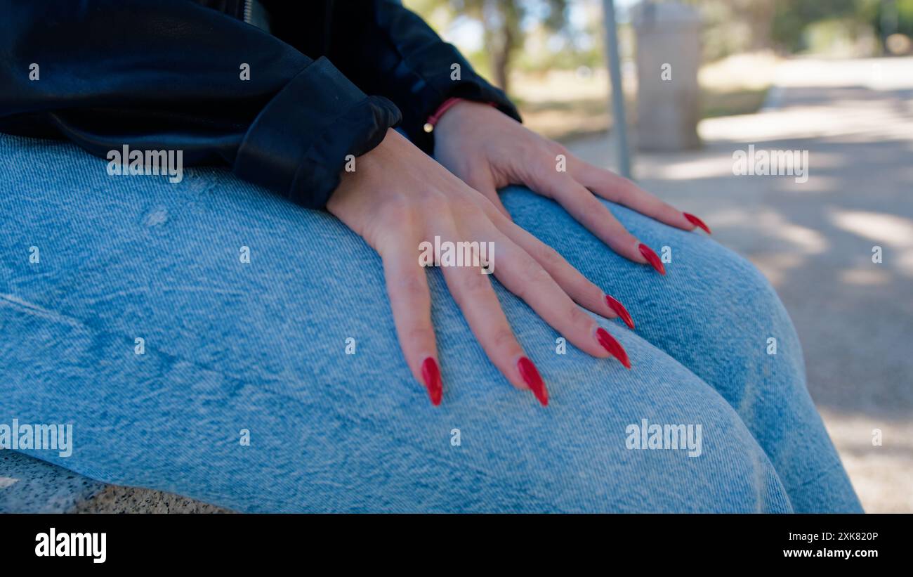 Hands between legs hi-res stock photography and images - Alamy