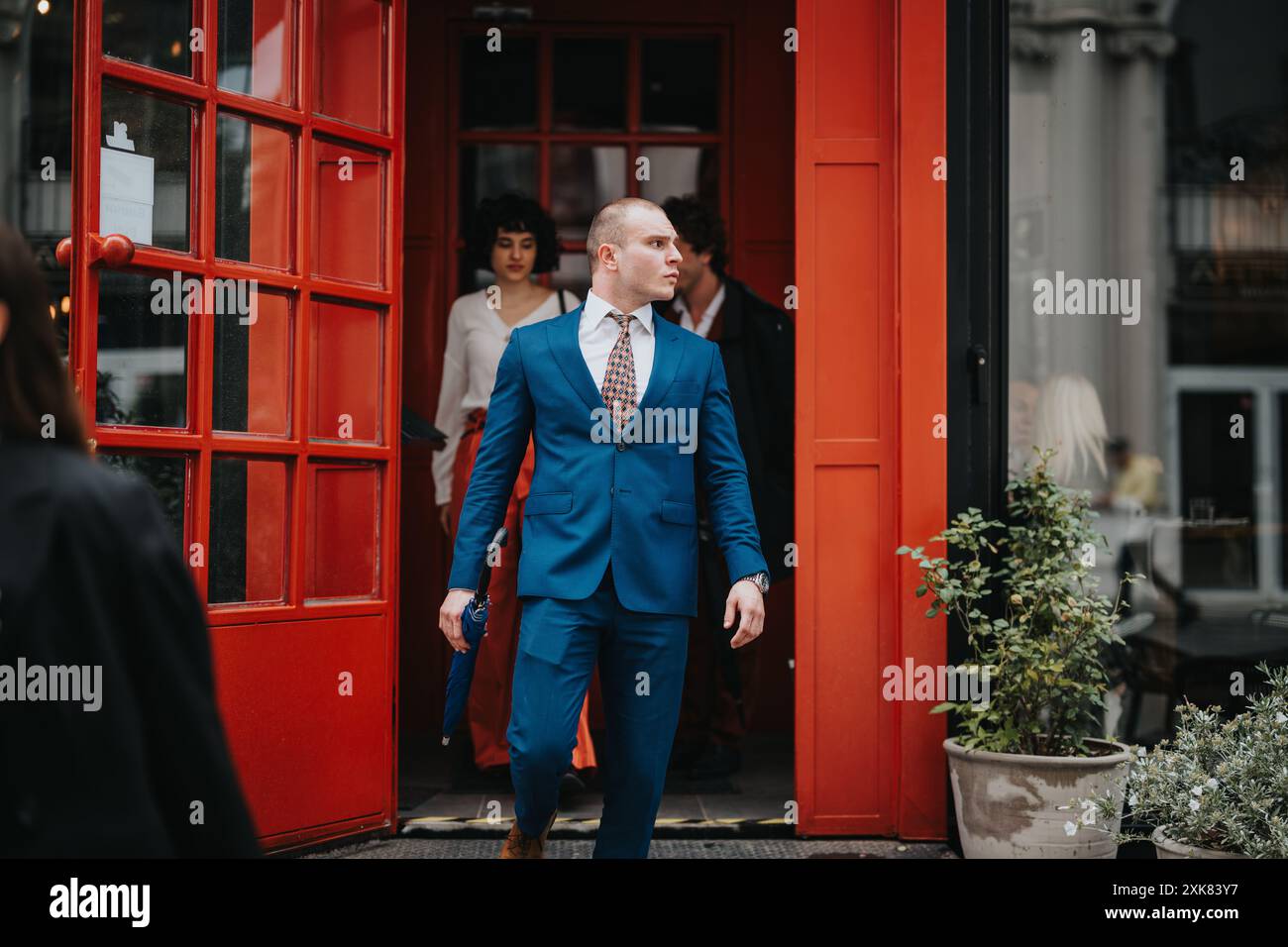 Walking out of coffee shop hi-res stock photography and images - Alamy