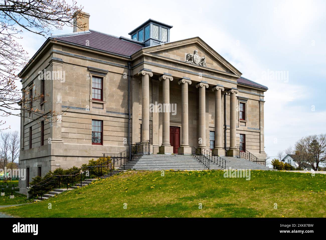 The exterior facade of a historic government building with large ...